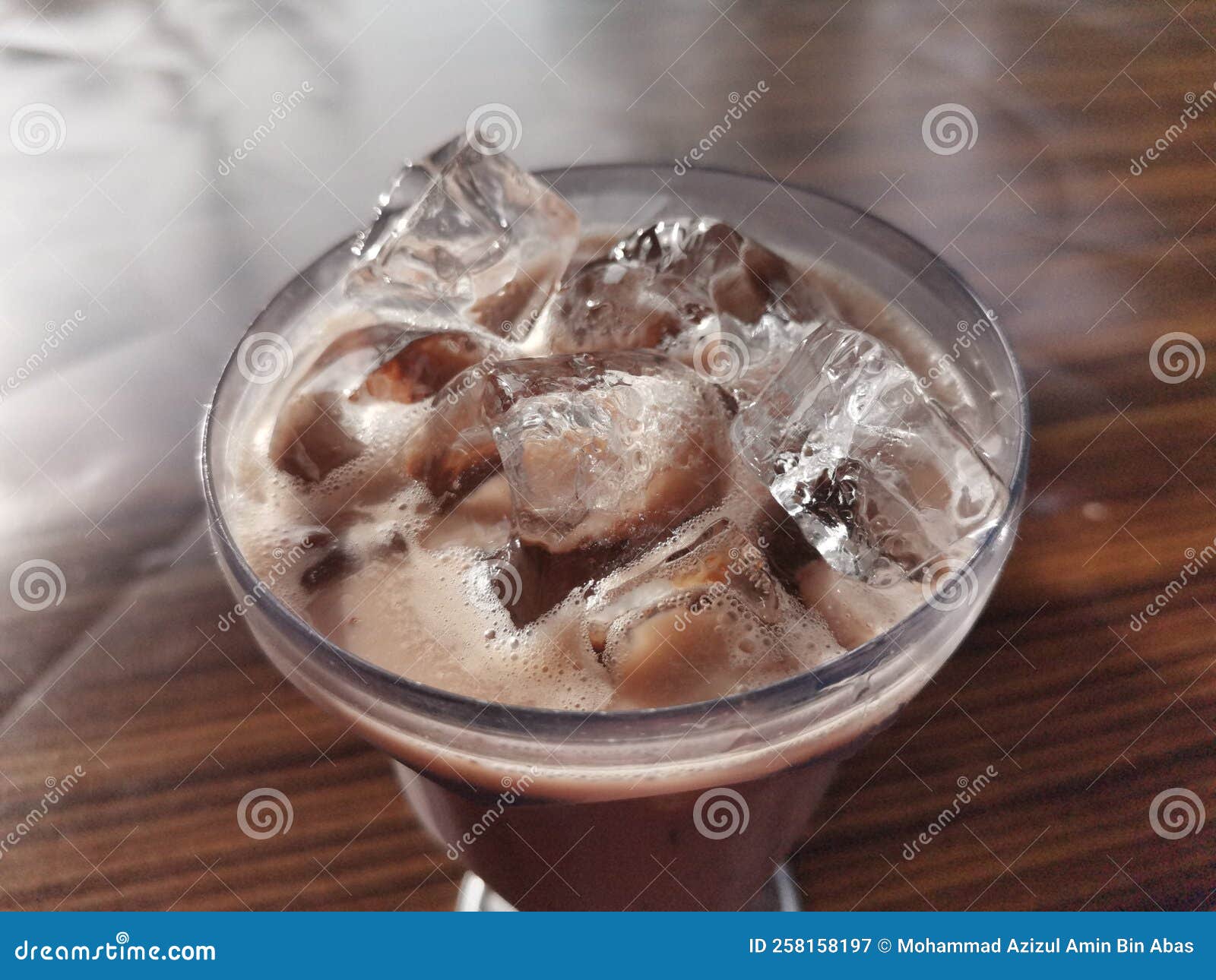 Iced Milo Chocolate Tea Served In Plastic Cup Isolated On Marble ...