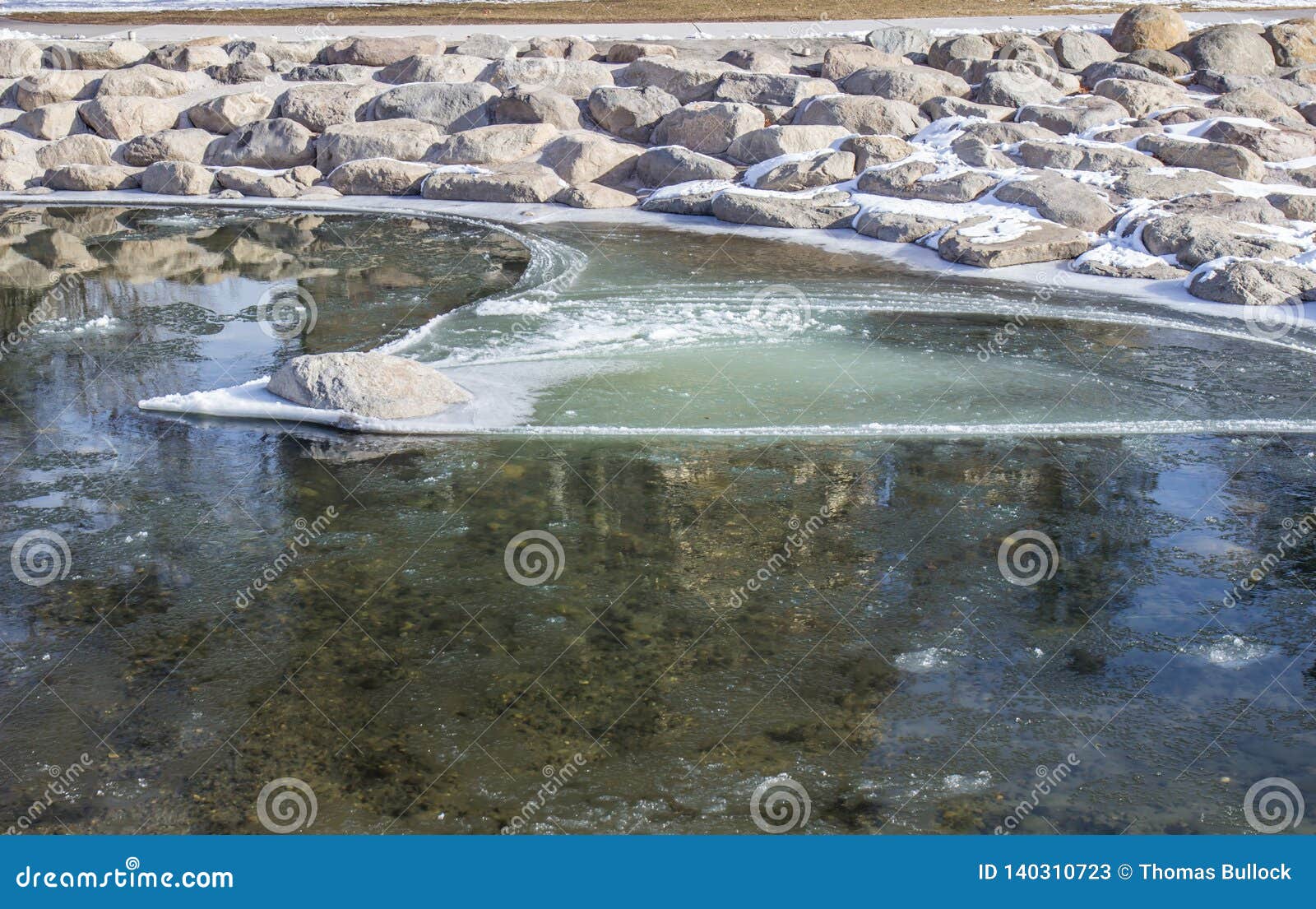 Iced Over River with Snow Covered Shoreline Stock Image - Image of snow ...