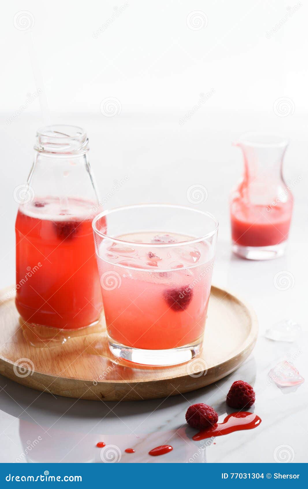 Iced red raspberry drinks stock photo. Image of melt - 77031304
