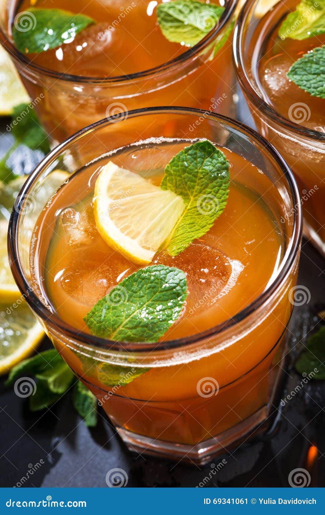Iced Tea with Mint and Lemon in Glasses on Dark Background Stock Image ...