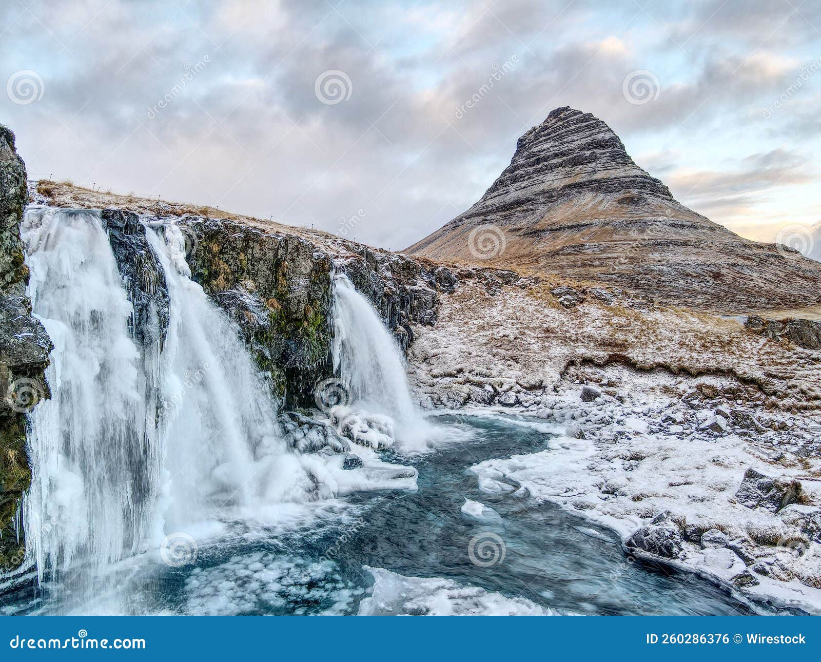 Iced Waterfall View in the Kirkjufell Hill, Iceland Stock Photo - Image ...