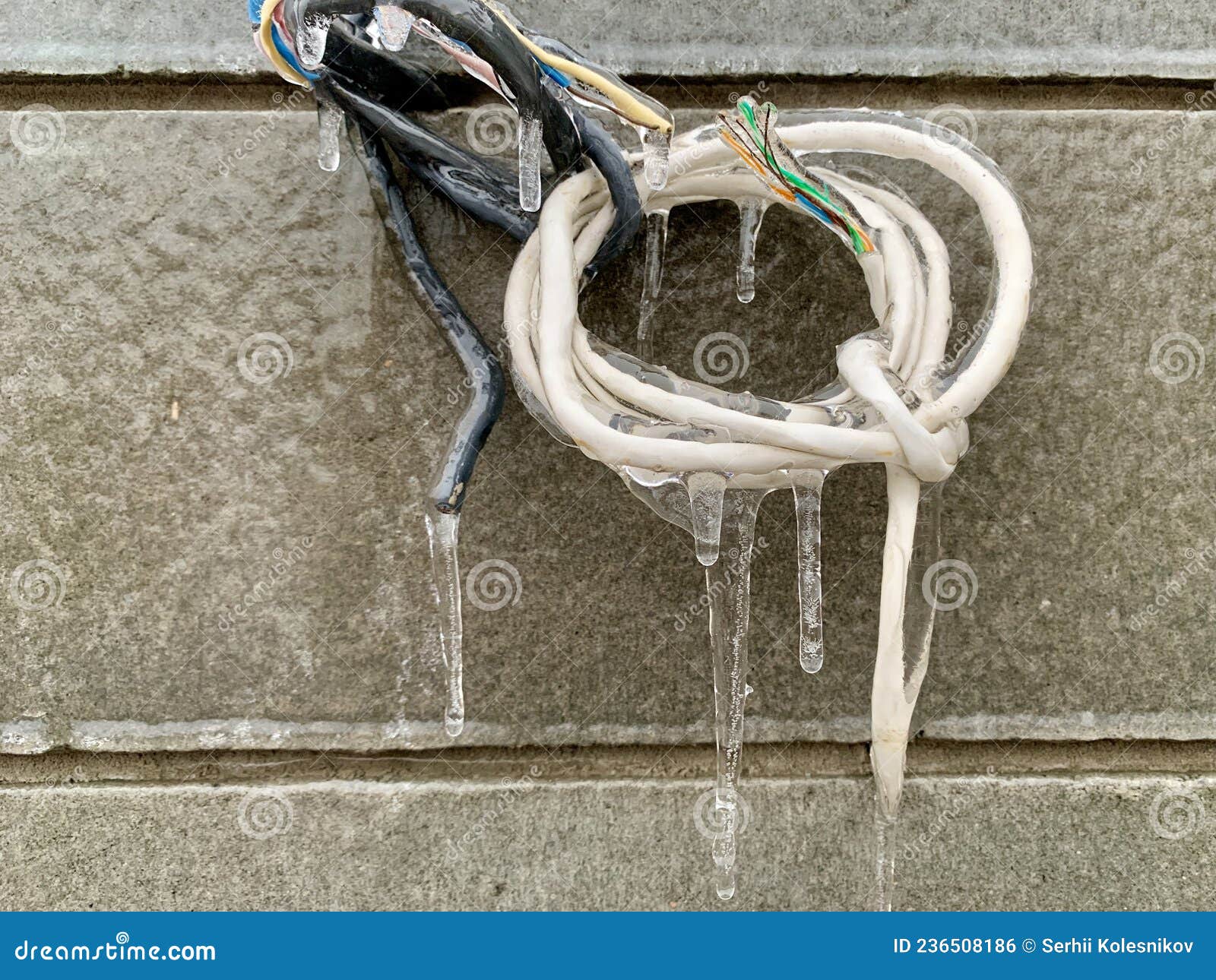 Icicle on Electrical Wiring. Ice Icicles on the Righteous. Concept ...