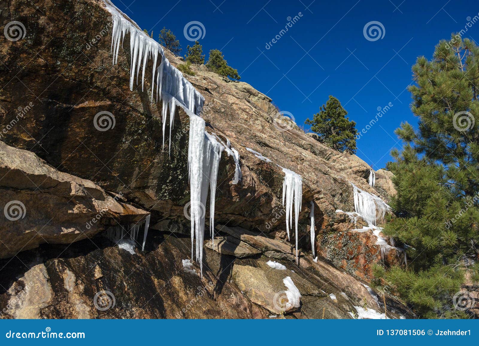 Icicle Stalactites Hanging from Rocks in the Mountains Stock Photo ...