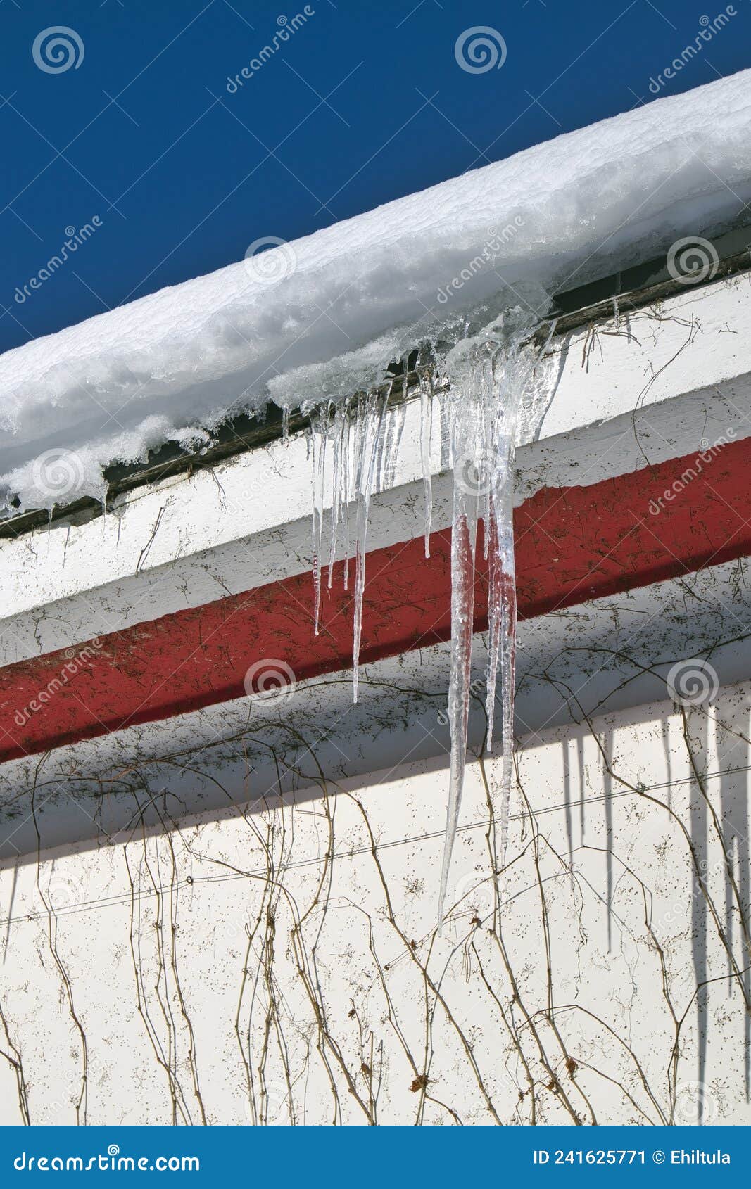 Icicles on the eaves stock image. Image of sharp, snow - 241625771