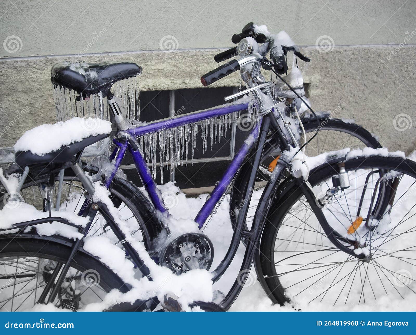 Icicles on the Frame of a Bicycle Standing on the Snow Stock Photo ...