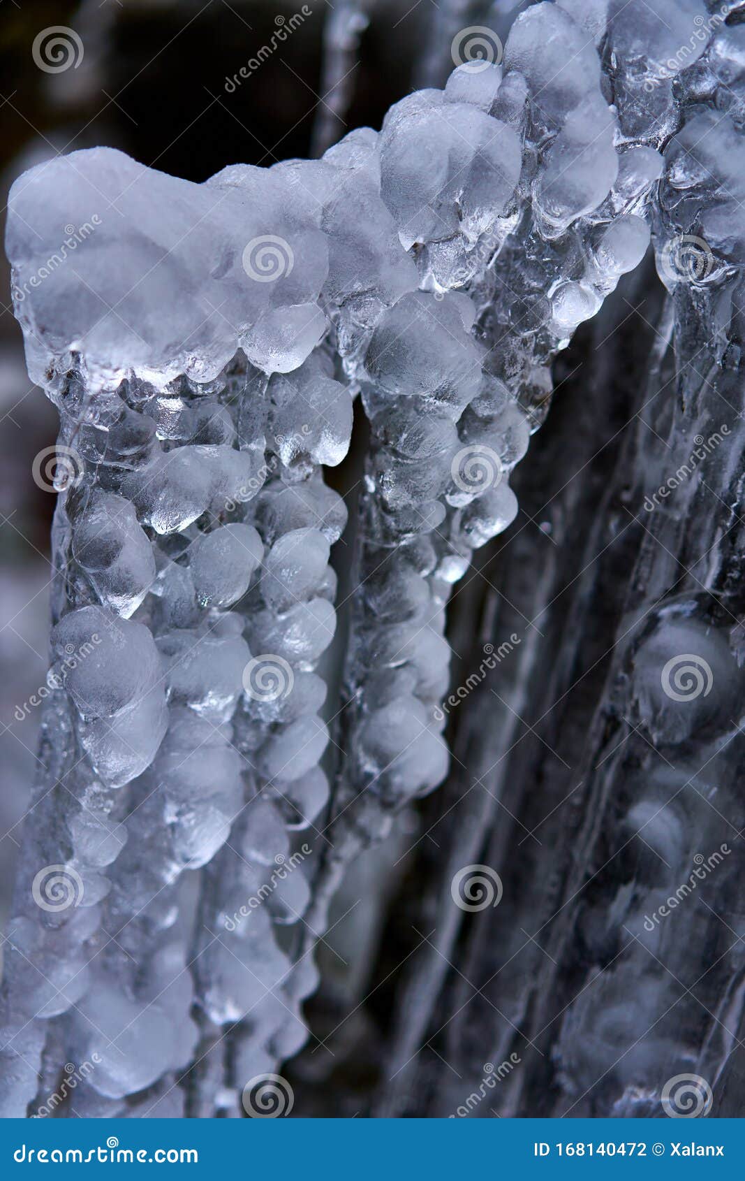 Icicles from a Frozen Waterfall Stock Photo - Image of light, rock ...
