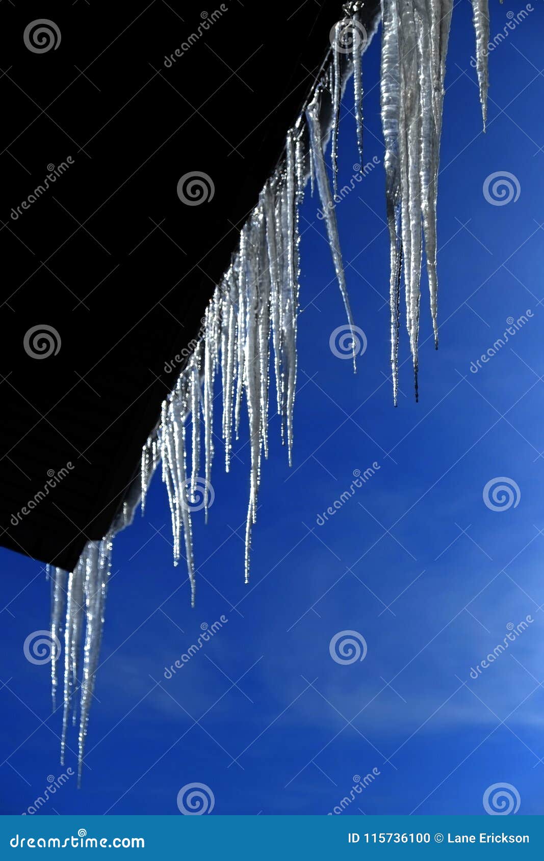 Icicles Hanging from Rooftop of Home Melted Ice Dripping Stock Photo ...