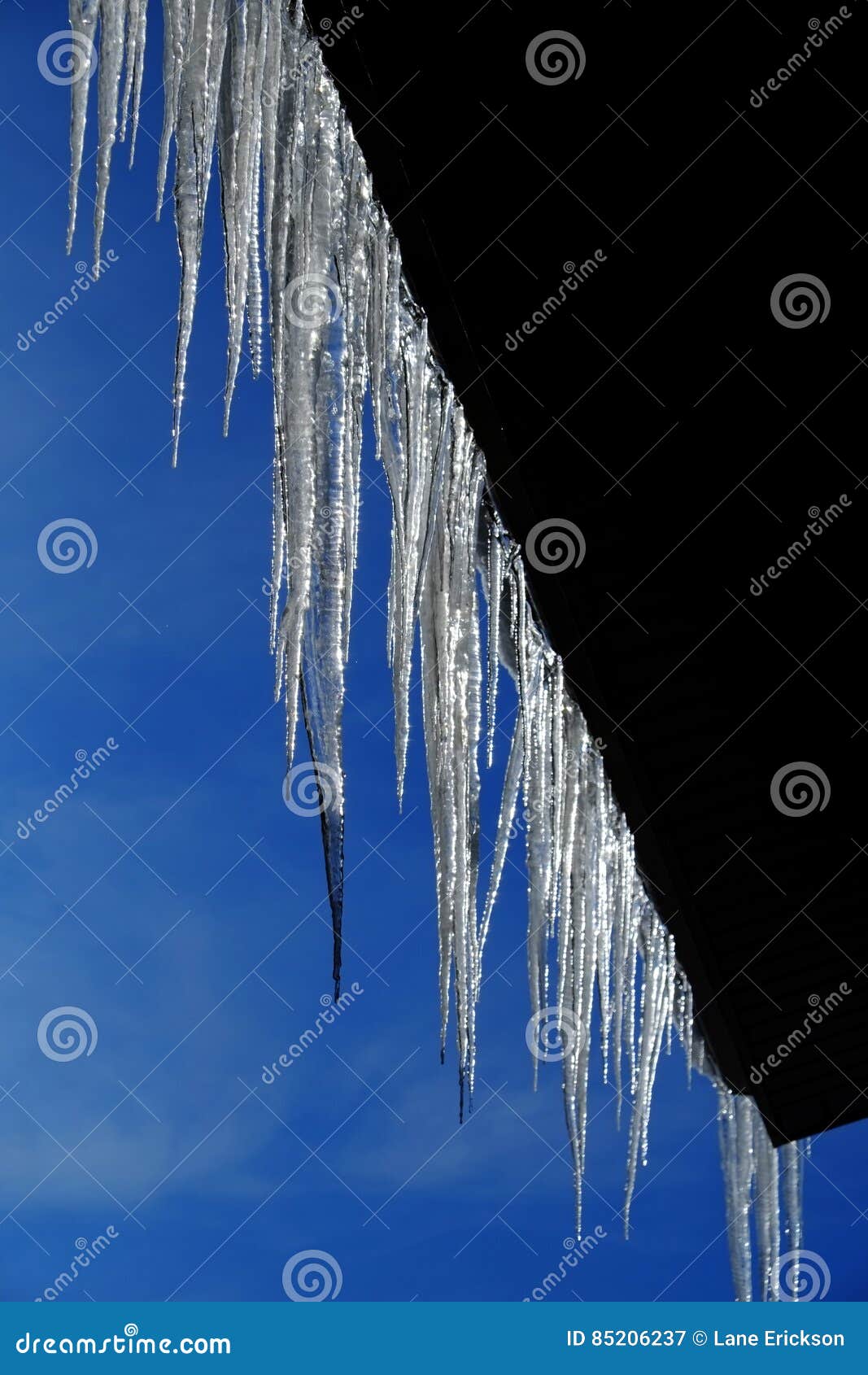 Icicles Hanging from Rooftop of Home Melted Ice Dripping Stock Image ...