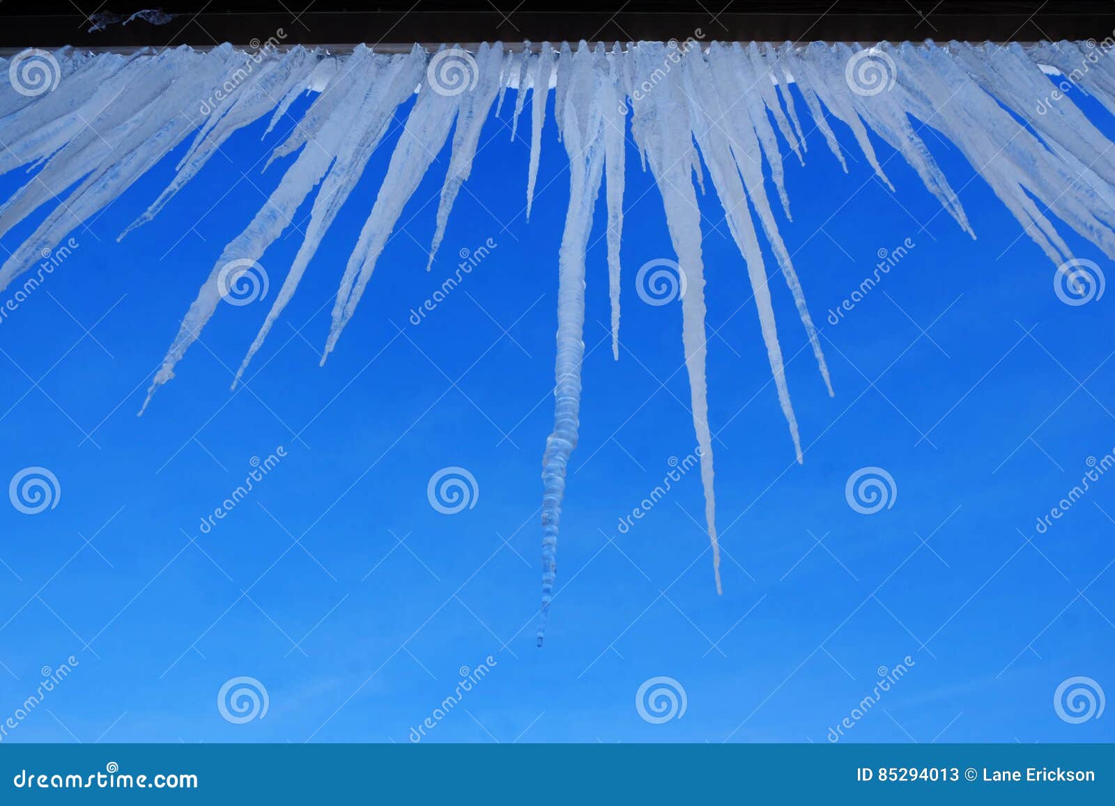 Icicles Hanging from Rooftop of Home Melted Ice Dripping Stock Image ...