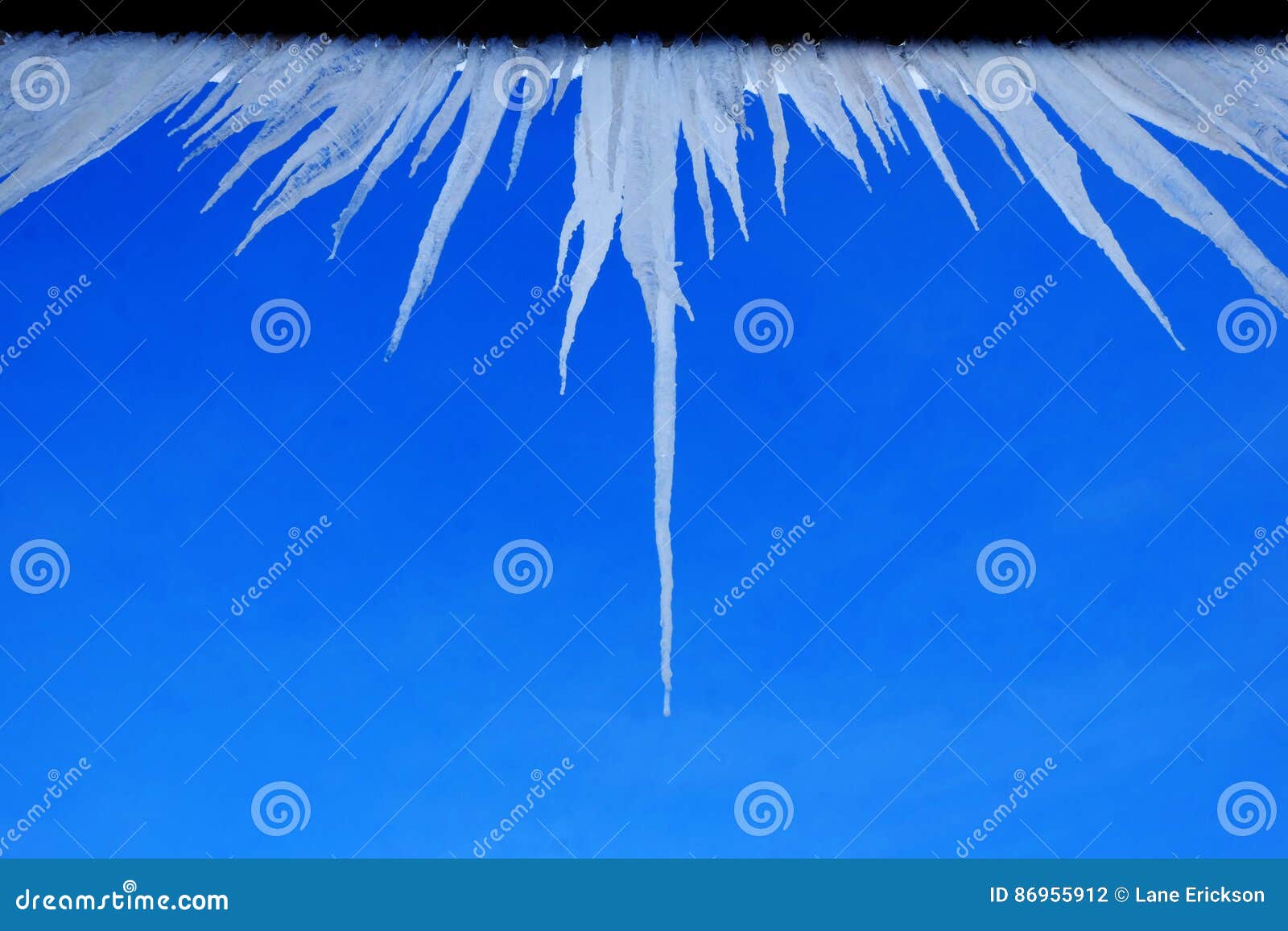 Icicles Hanging from Rooftop of Home Melted Ice Dripping Stock Photo ...