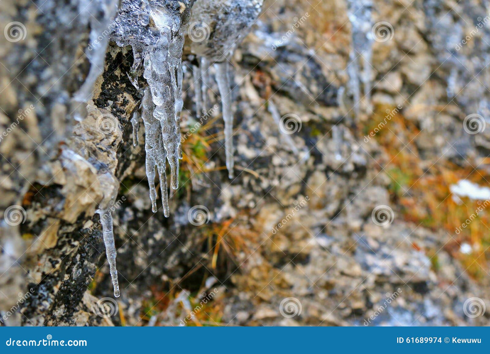 Icicles Hanging on Stone Wall during Winter Stock Photo - Image of ...