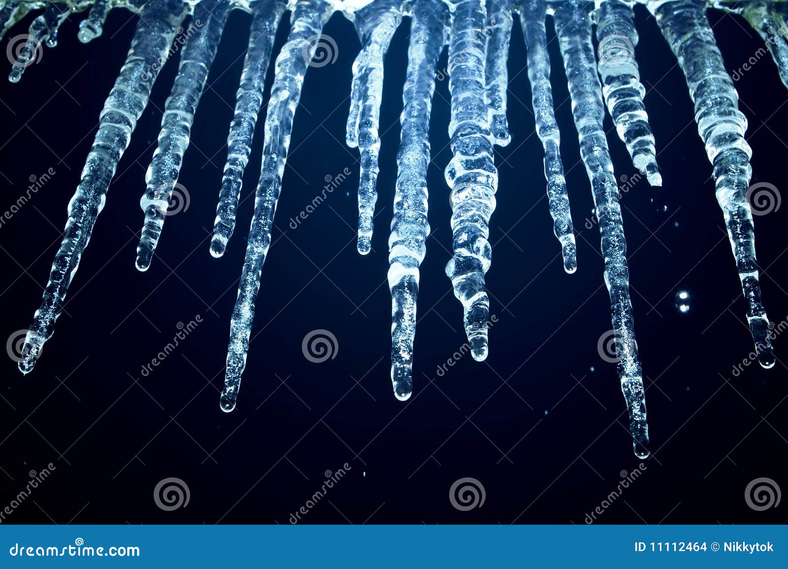 Icicles at night stock photo. Image of glitter, frozen - 11112464
