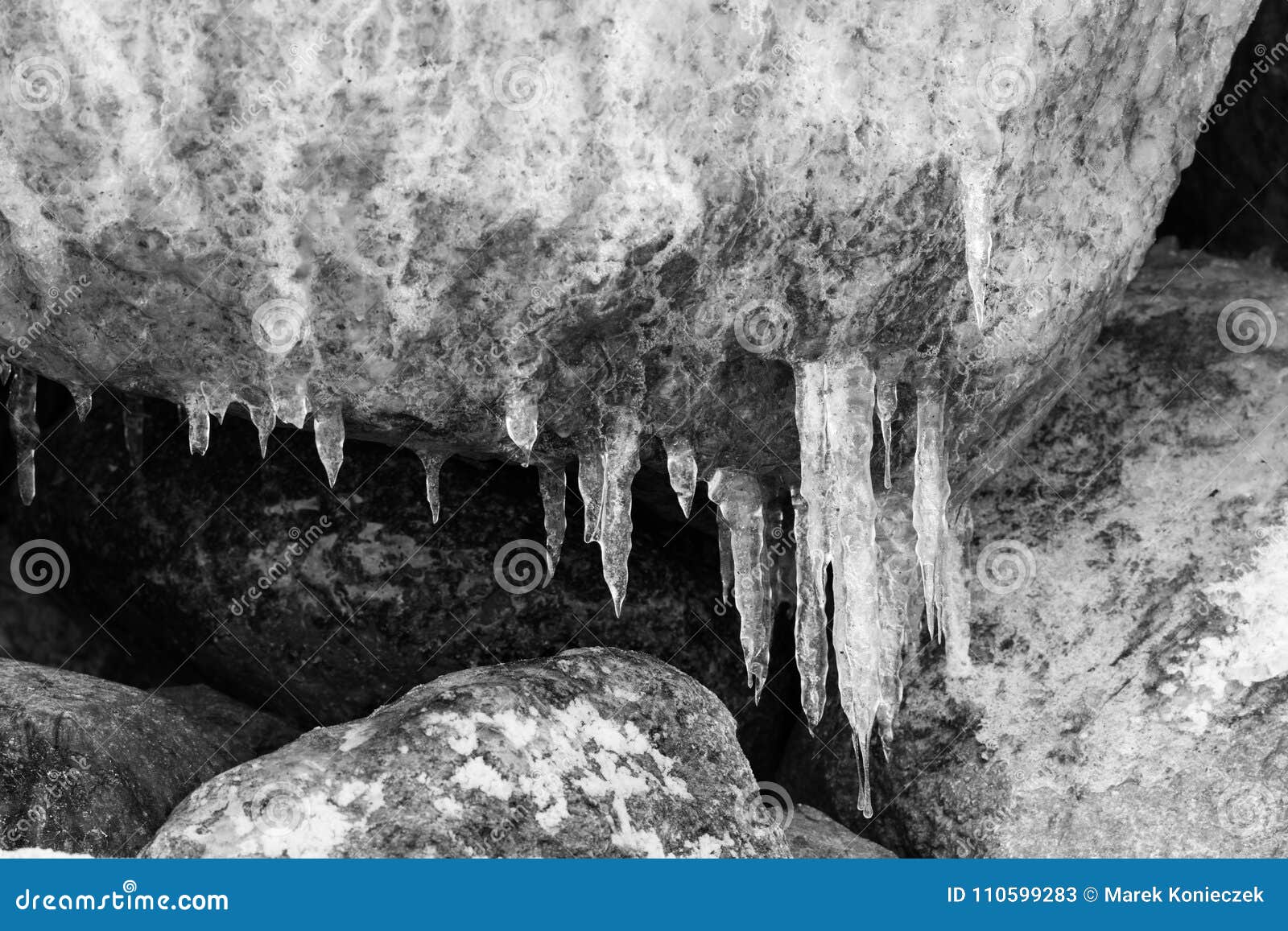 Icicles on the rocks stock image. Image of stone, icicles - 110599283