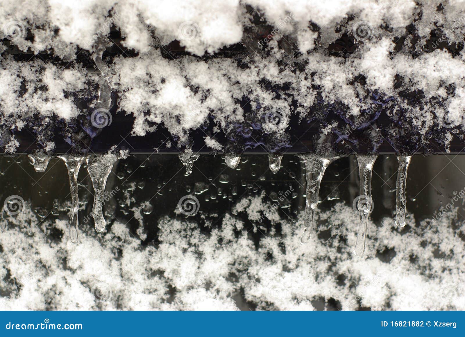 Icicles with snow and ice stock photo. Image of reflected - 16821882