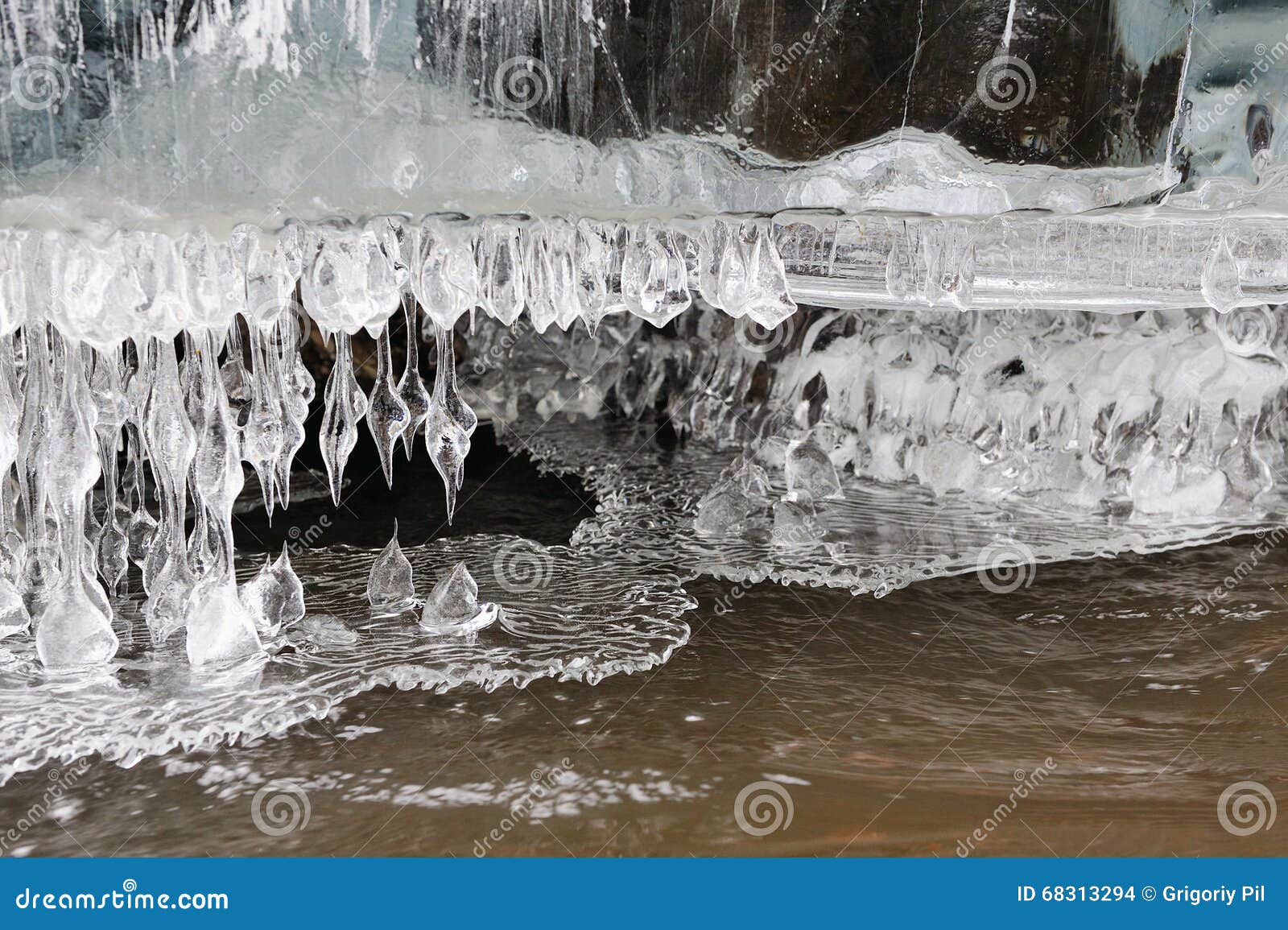 Icicles and water flow stock photo. Image of cool, closeup - 68313294