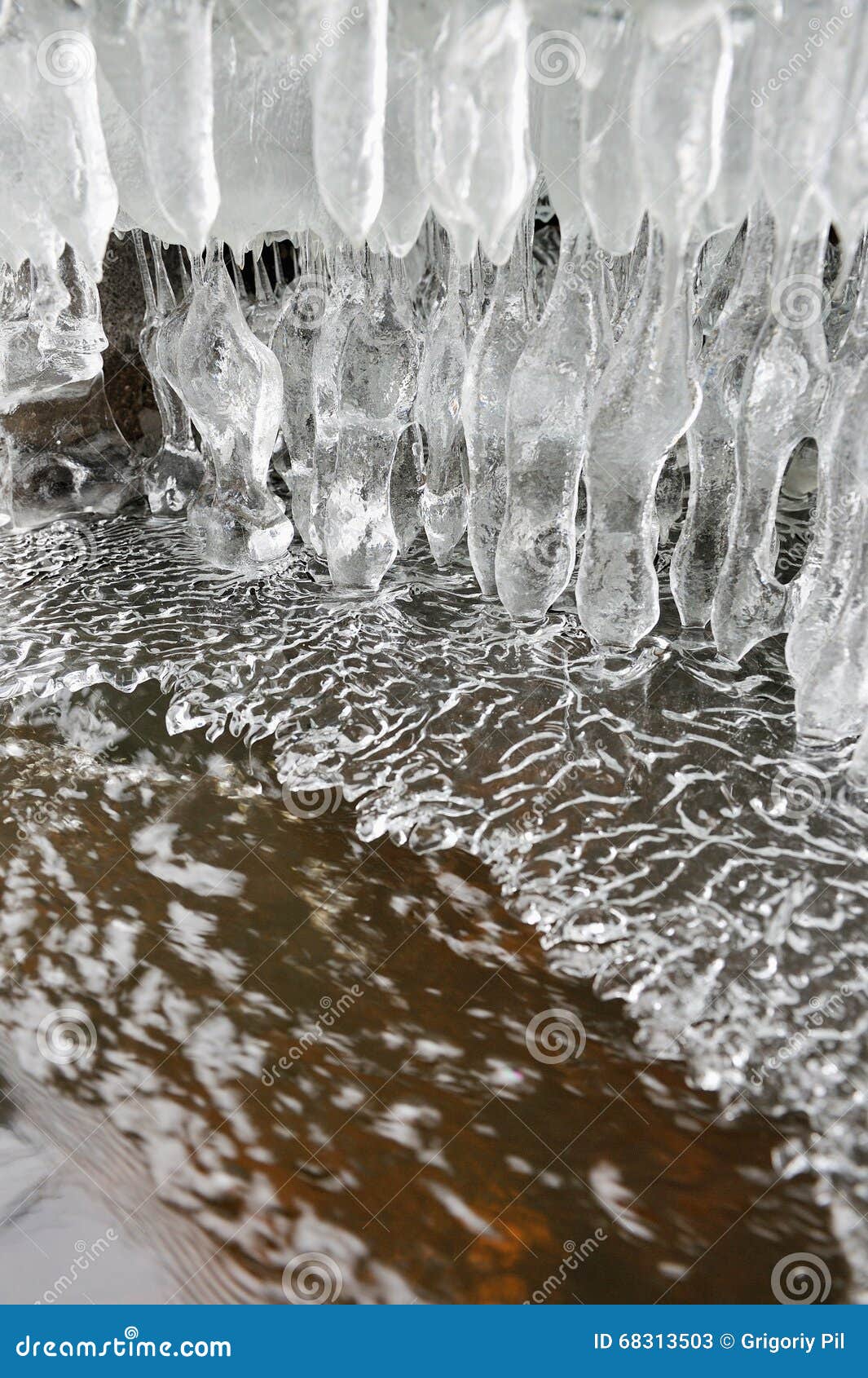 Icicles and water flow stock image. Image of backdrop - 68313503