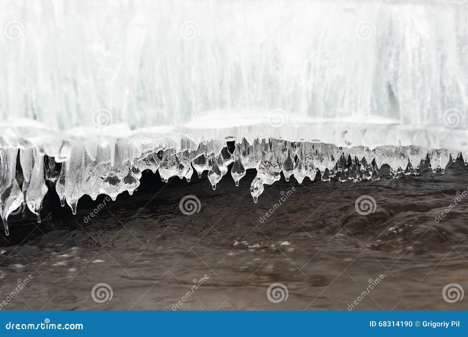 Icicles and water flow stock photo. Image of nature, pattern - 68314190