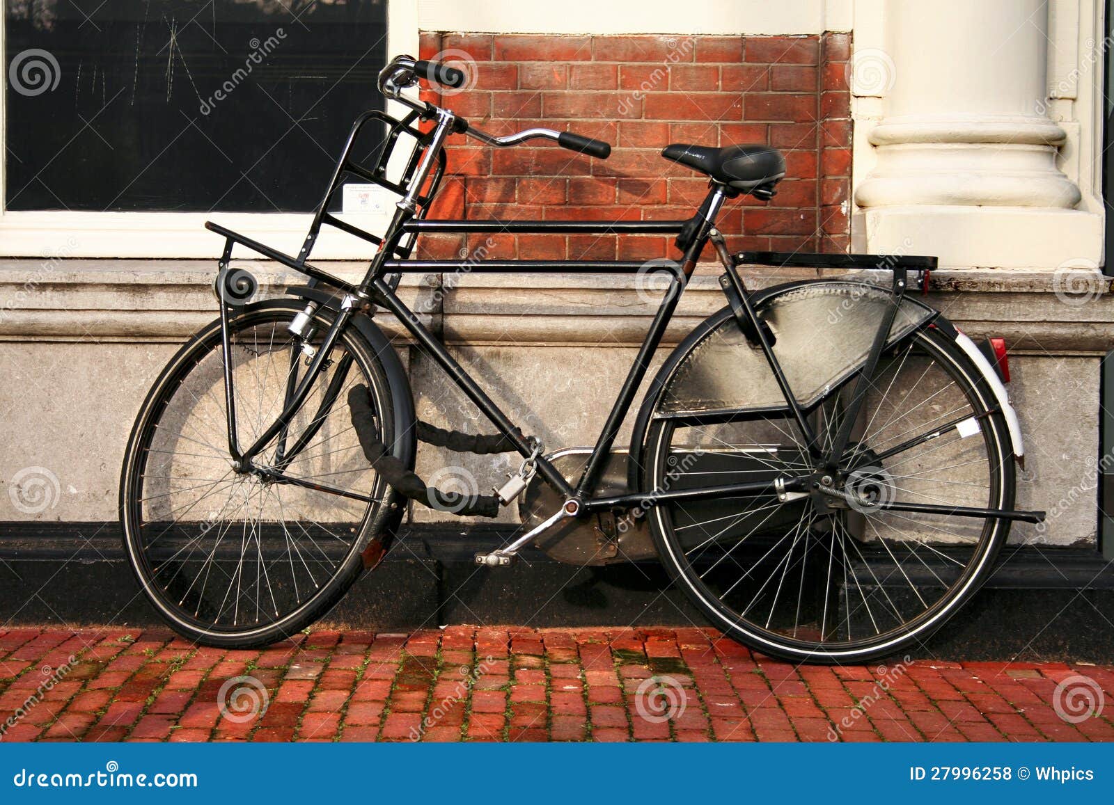 Iconic bicycle resting stock photo. Image of holland - 27996258