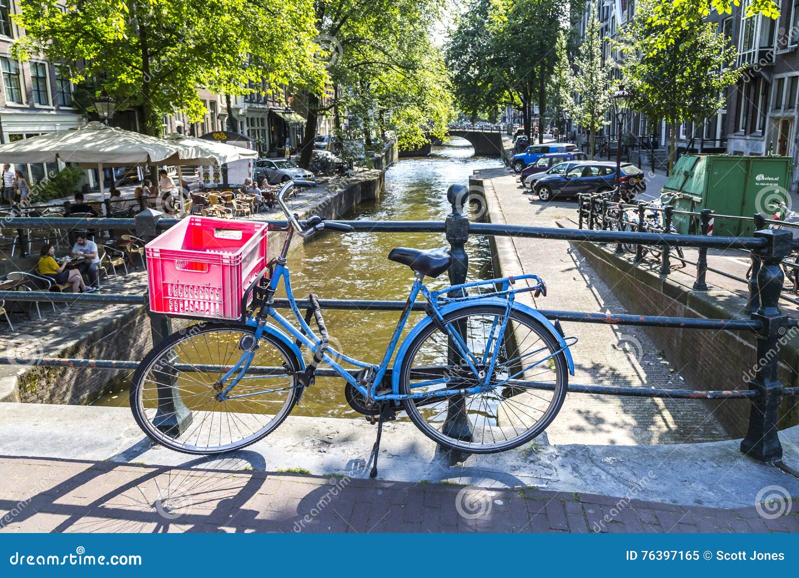 Dutch Bicycle Or Bakfiets At Amsterdam Street Canal With Bridge ...