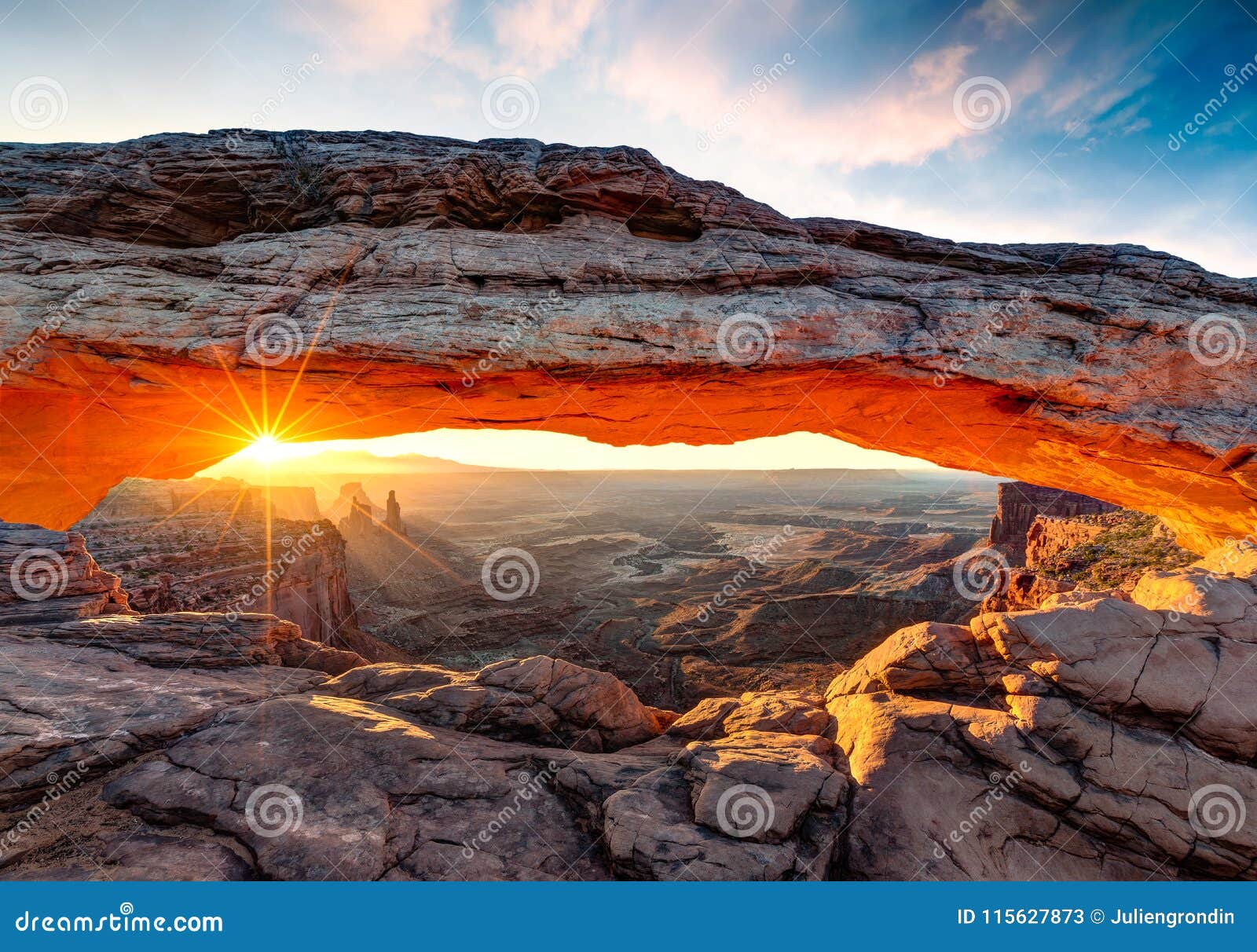 Mesa Arch at sunrise stock image. Image of sunrise, arch - 115627873