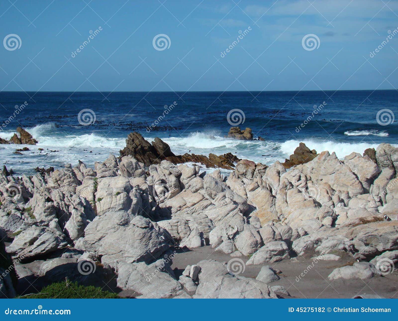 Icy blue water and rocks stock photo. Image of blue, rocks - 45275182