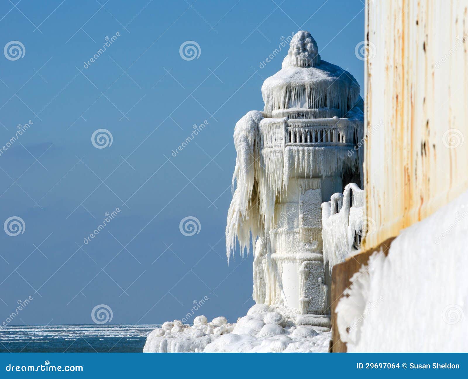Icy Lighthouse at the Cold Water S Edge Stock Photo - Image of winter ...