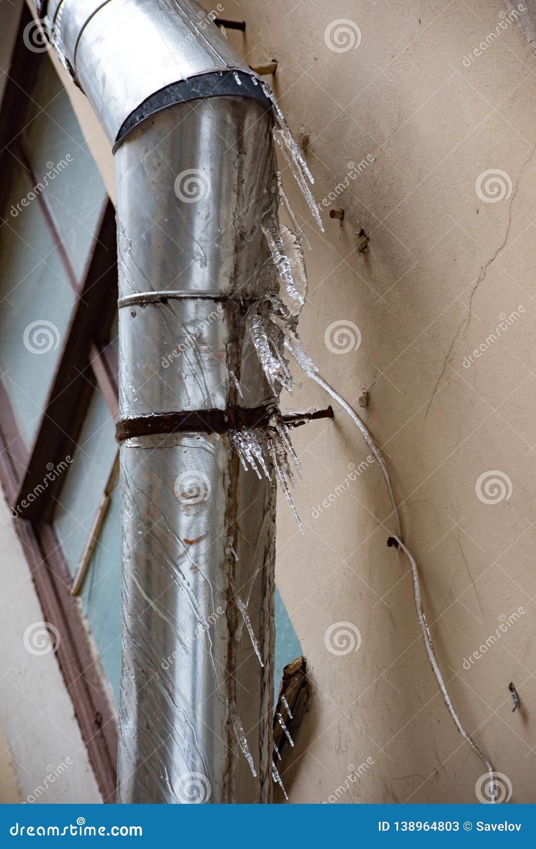 Icy metal drainpipe stock image. Image of danger, nature - 138964803