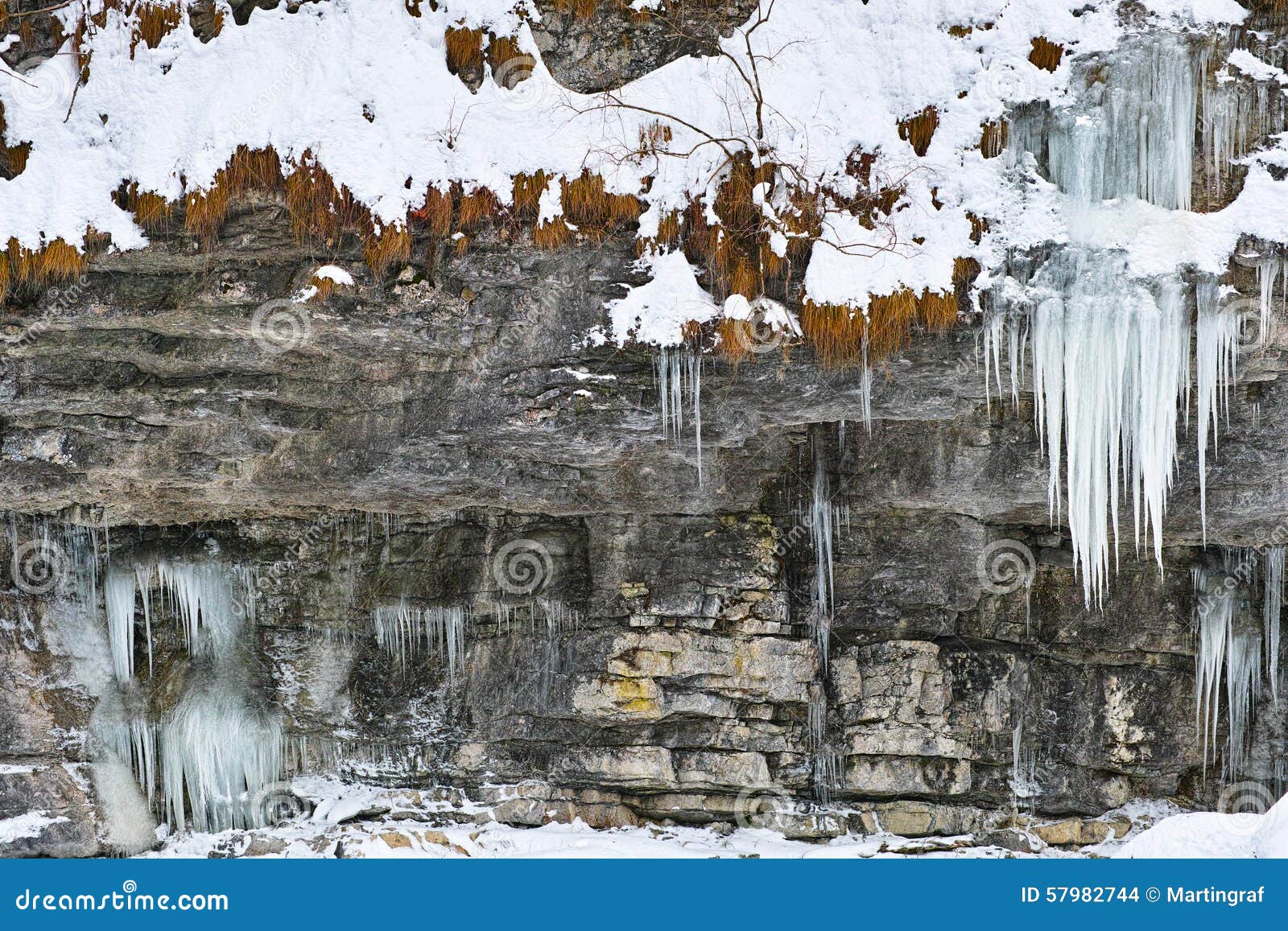 Icicles on Rock Face Background Stock Photo - Image of icescape ...