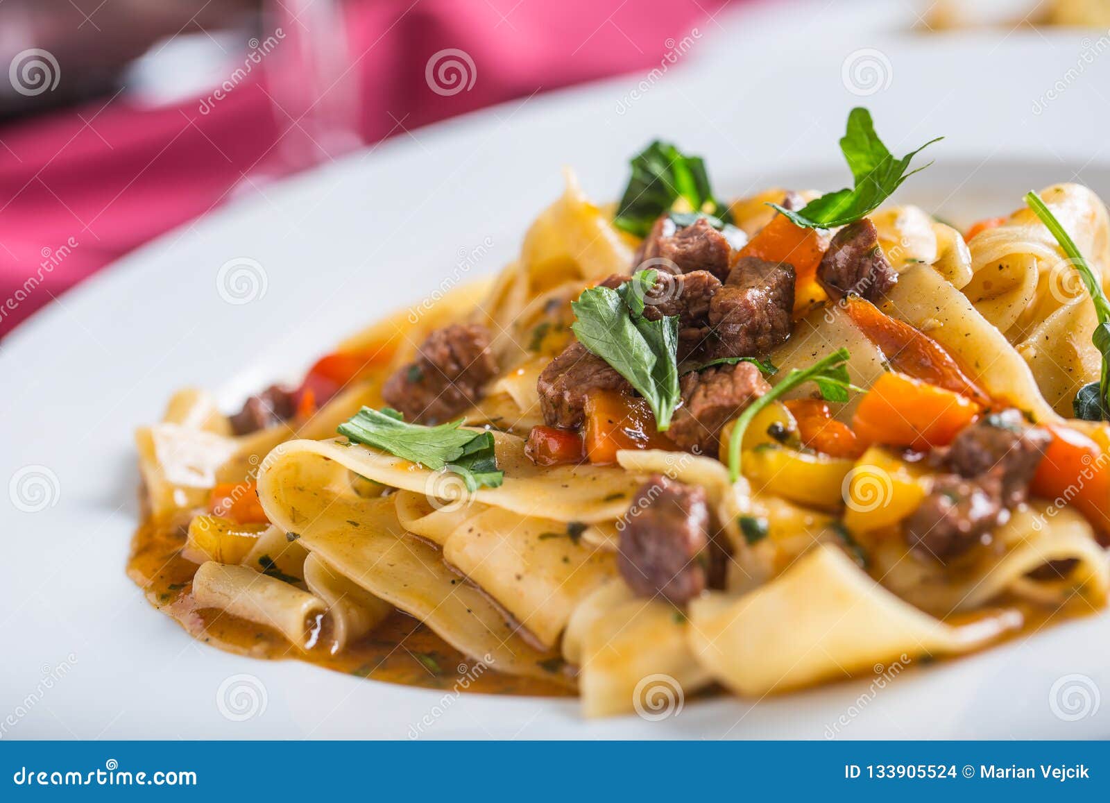 Idalian Pasta Pappardelle with Beef Ragout on White Plate Stock Photo ...