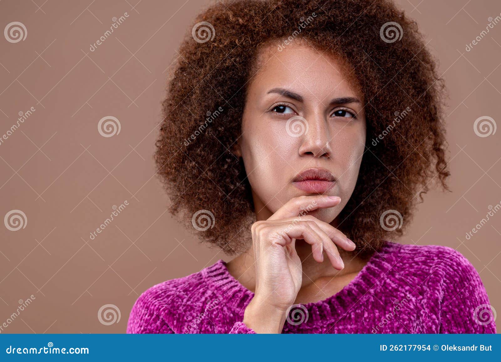 Dark-haired Young Woman Looking Thoughtful Stock Photo - Image of ...