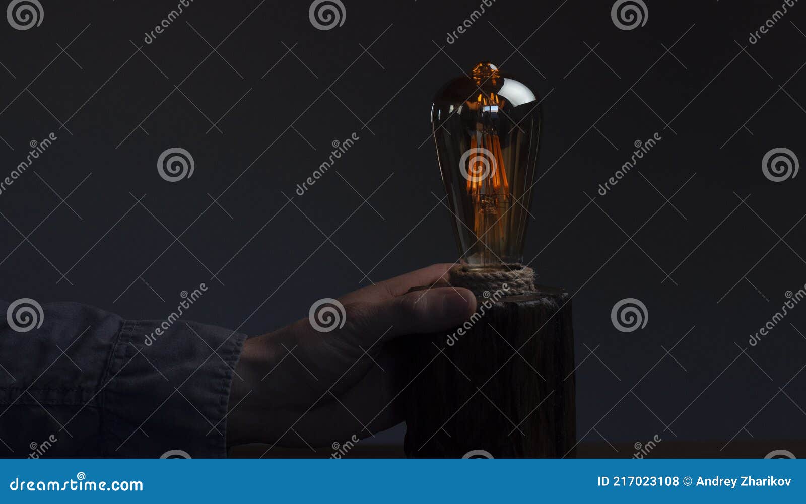 Idea Lamp in Hand in the Dark. Extinguished Lamp. Night Stock Photo ...
