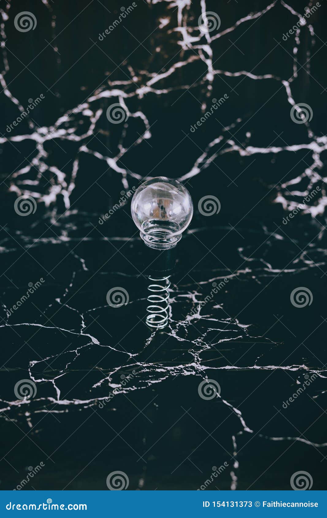 Idea Lightbulb Popping Up on Spring with Black Marble Background Stock ...