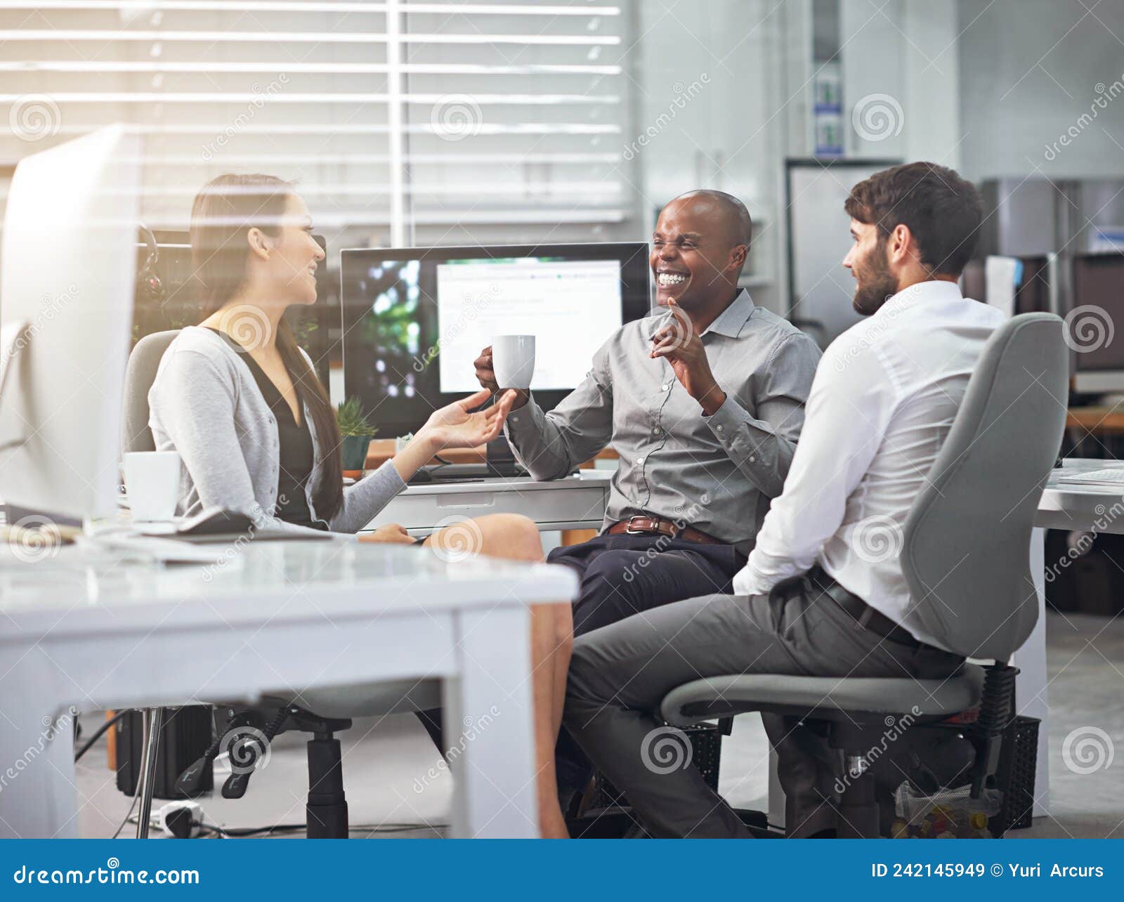 That Idea is Perfect. Shot of Coworkers Having a Chat at the Office ...