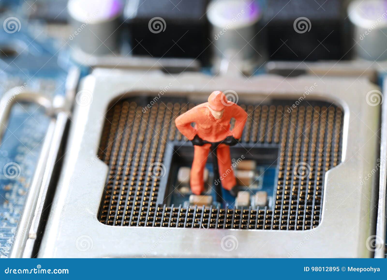 Idea of a Worker is Miners are Digging for Ore on Computer Mainboard ...
