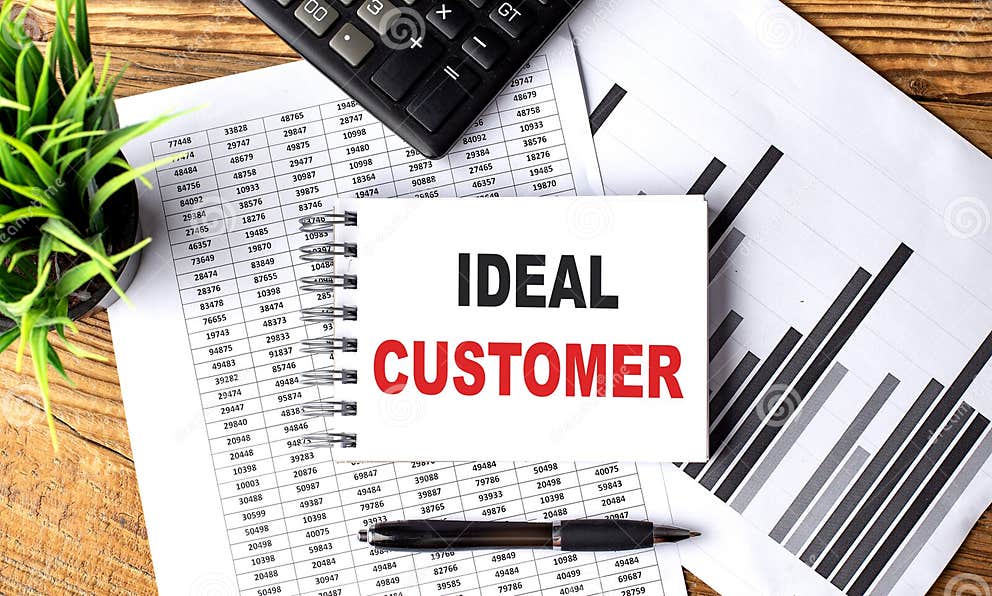 IDEAL CUSTOMER Text on a Notebook with Chart and Calculator Stock Image ...
