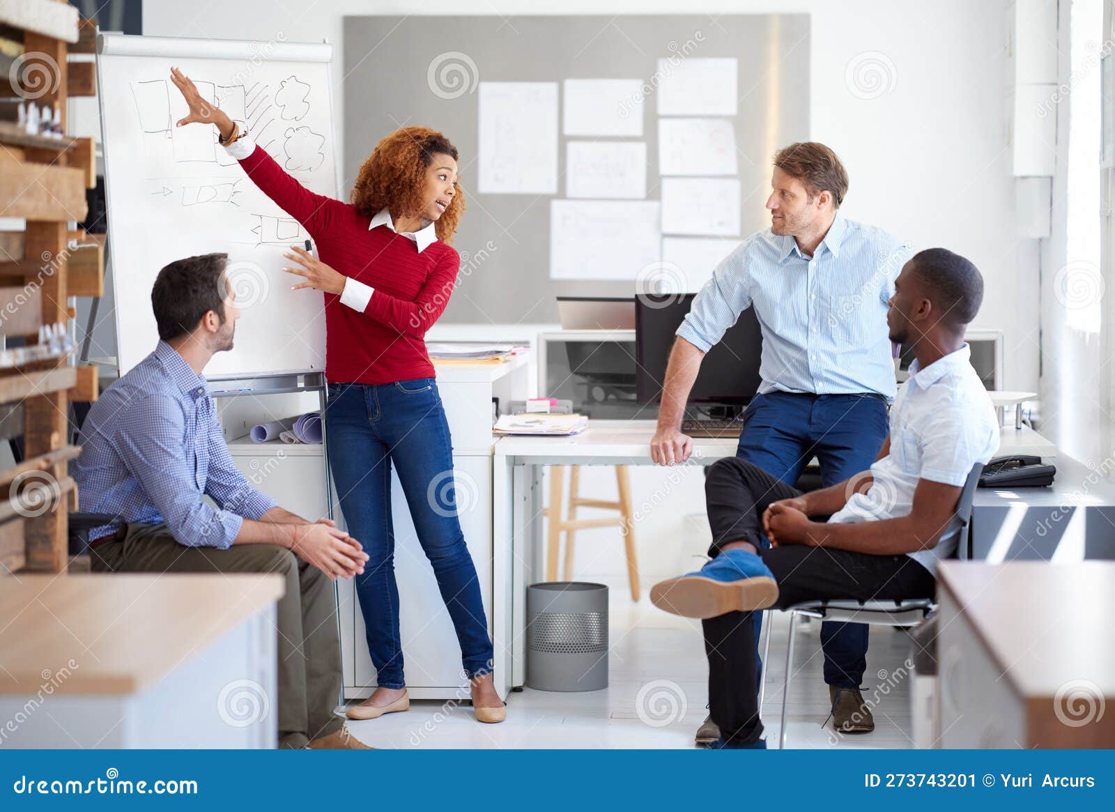 The Ideas are Flowing Now. a Group of Designers Talking Together in a ...