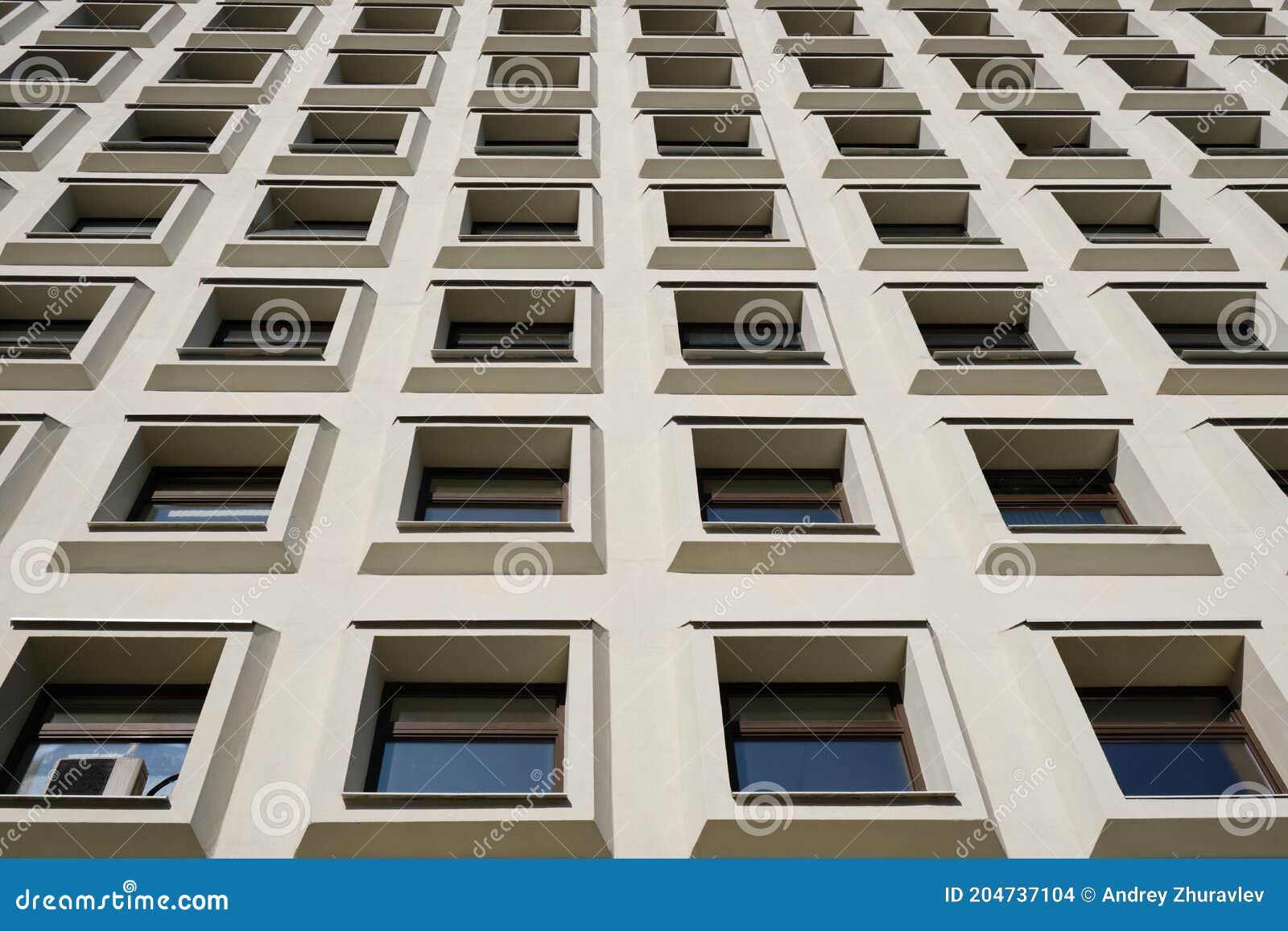 Identical Square Windows of a Concrete Building with Air Conditioning ...