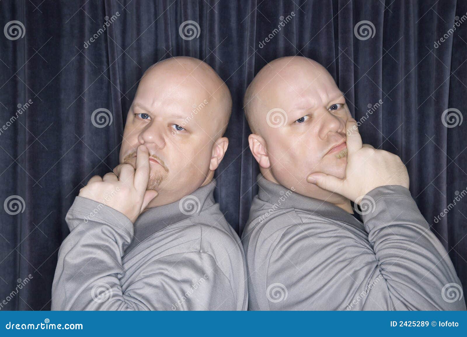 Identical twin men. stock image. Image of fingers, goatee - 2425289