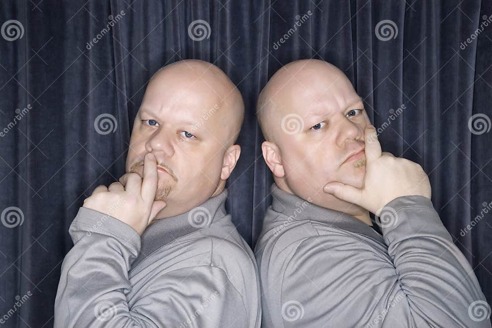 Identical twin men. stock image. Image of fingers, goatee - 2425289