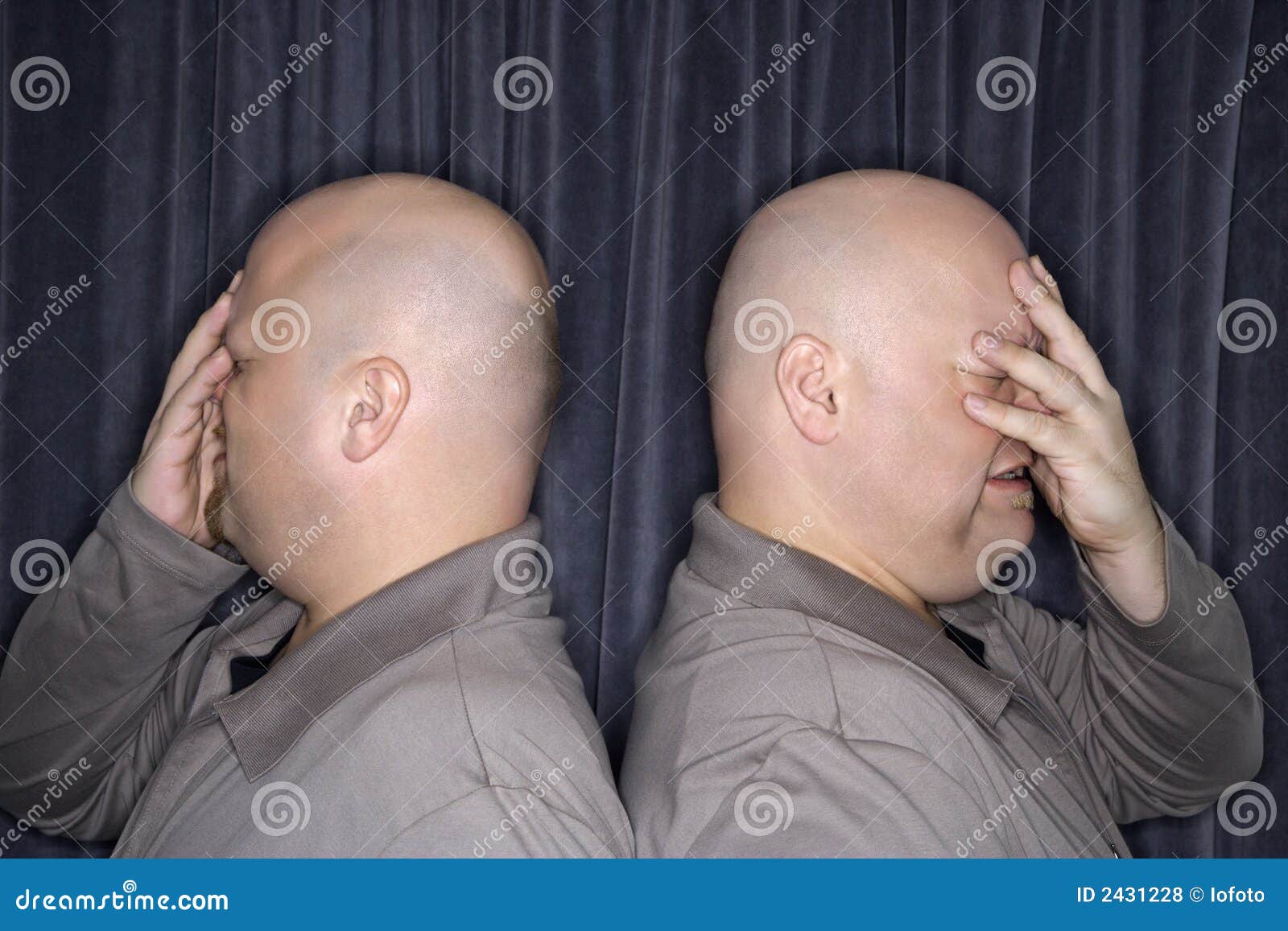 Identical twin men. stock photo. Image of covering, conceal - 2431228