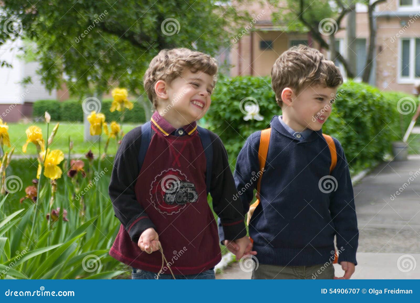 Identical twins held hands stock image. Image of twins - 54906707