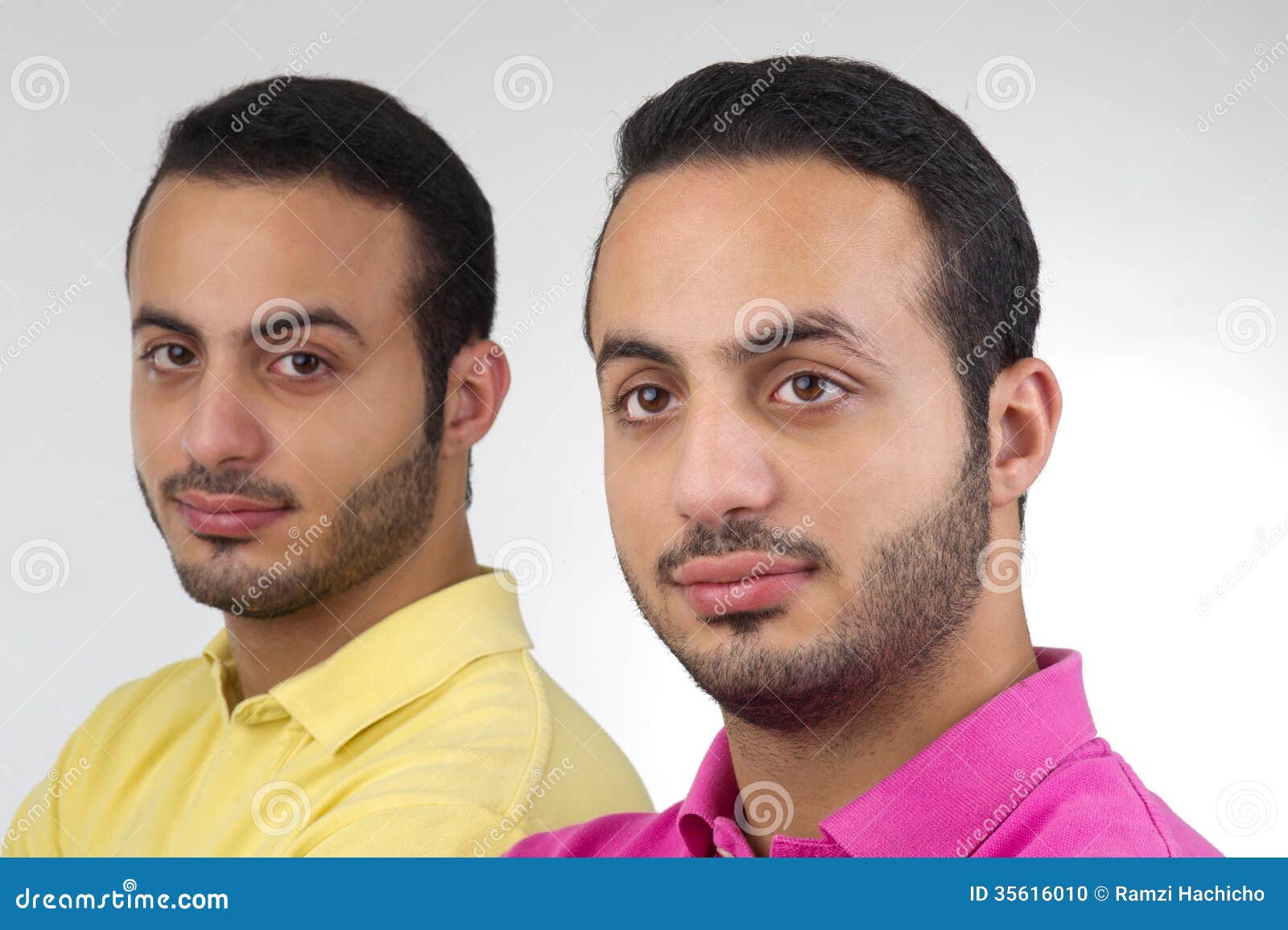 Identical Twins Portrait Shot Against White Background Stock Photo ...