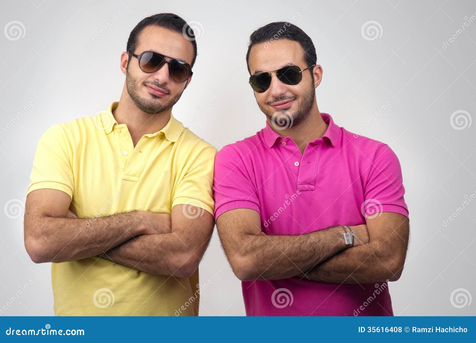 Identical Twins Portraits Shot Against White Background Stock Photo ...