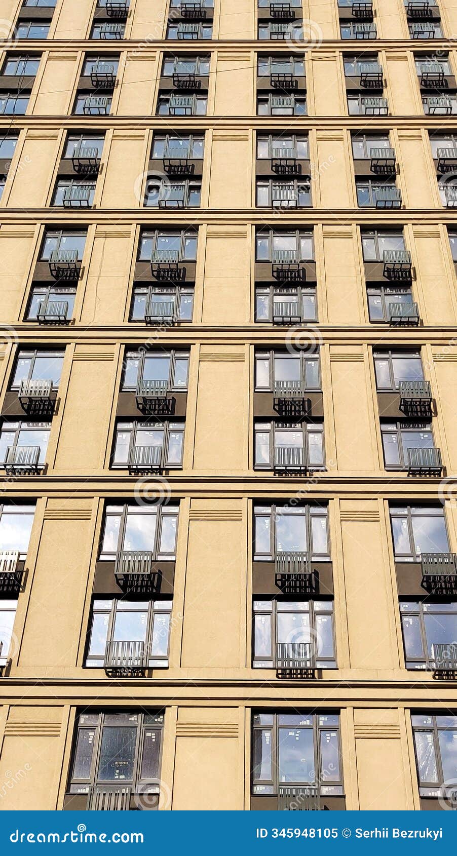 Identical Windows of the Facade of a High-rise Building in Even ...