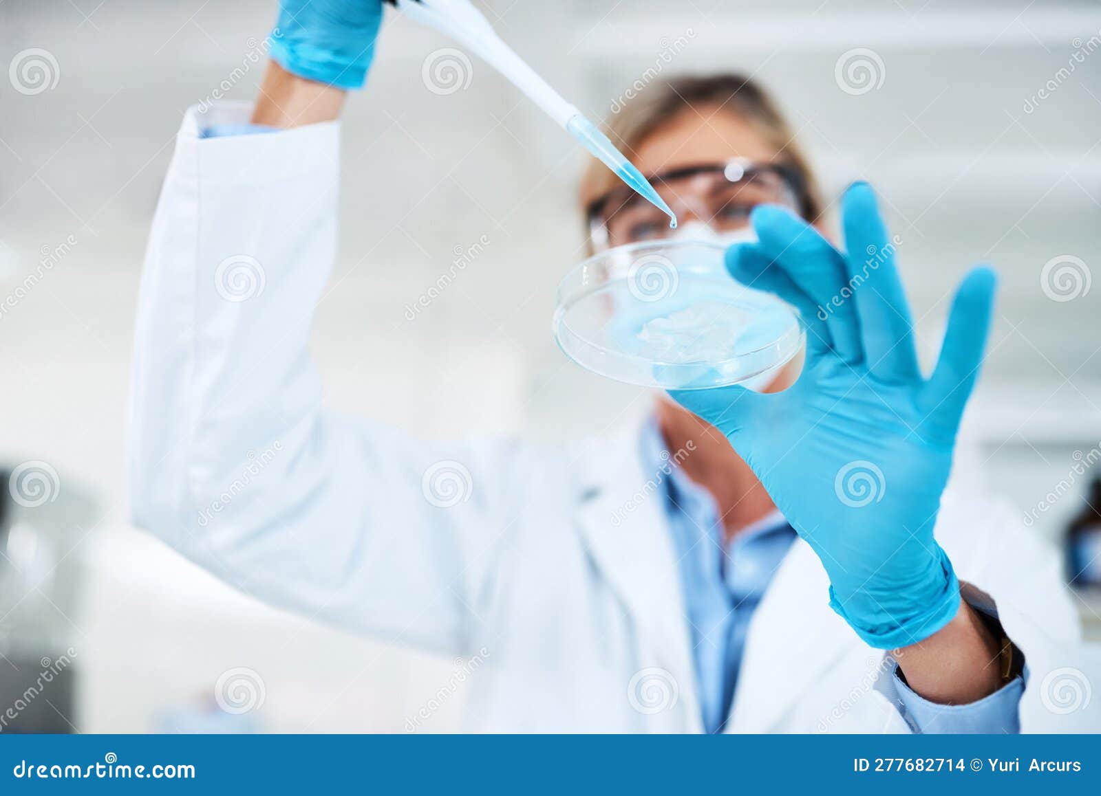 Identifying and Observing Something New. a Scientist Using a Dropper ...