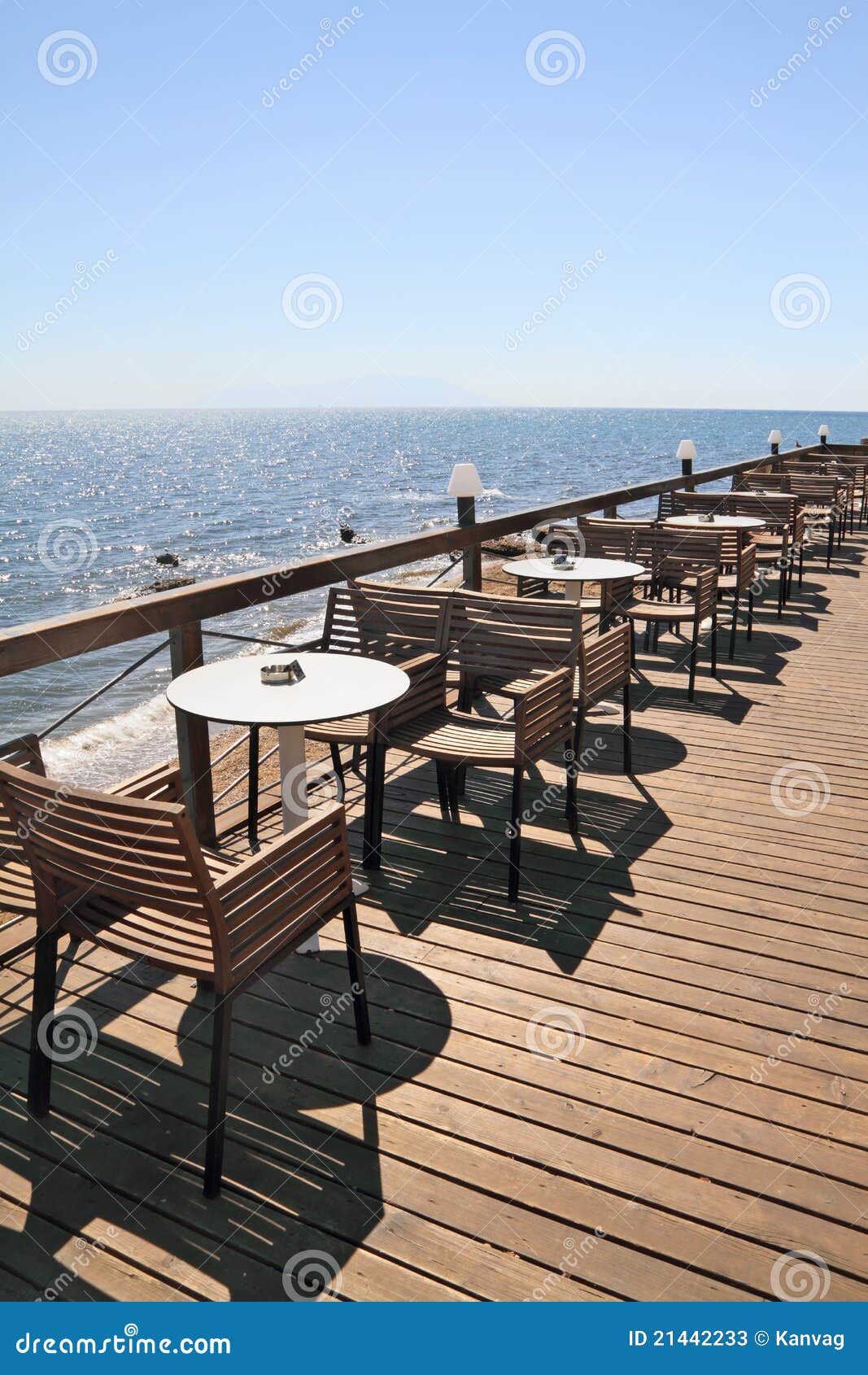 Idyllic cafe by the sea stock image. Image of resort - 21442233