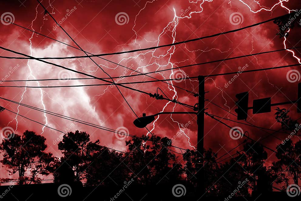 Idyllic Landscape Featuring Trees with Electrical Lines and Bright Red ...