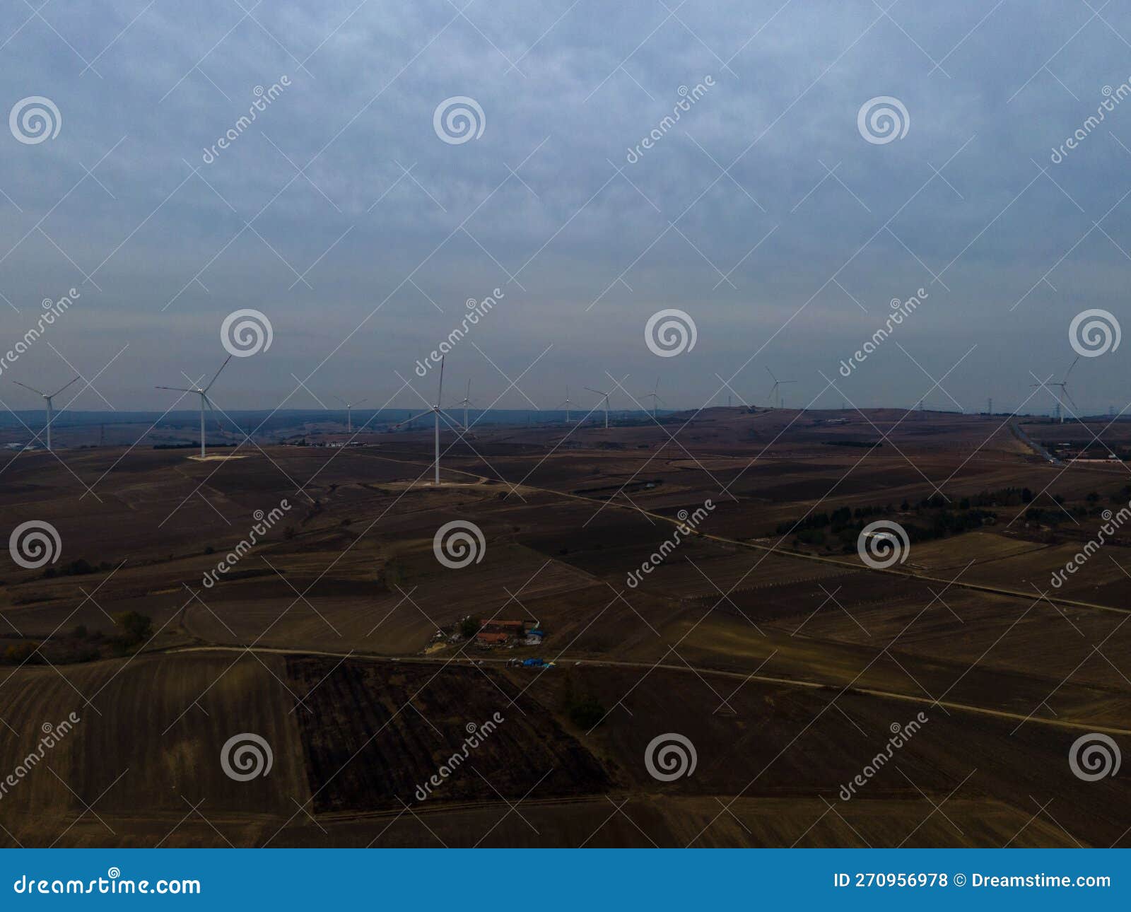 Idyllic Landscape View Featuring a Group of Large Wind Turbines Set ...