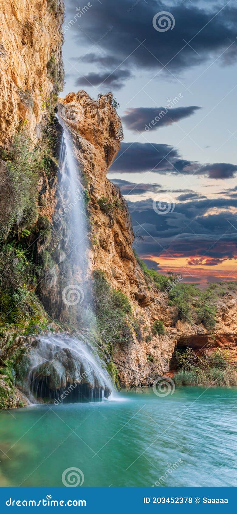 Idyllic Waterfall Bottom View at Dusk with Cloudy Sky Stock Photo ...