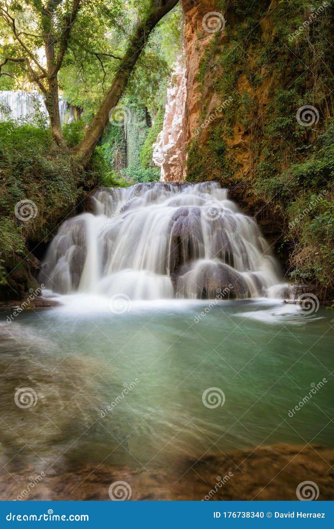Idyllic Waterfall in Rainforest Landscape. Water Flowing in Tranquil ...